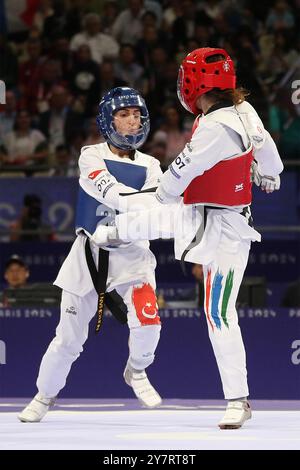 Nurcihan EKINCI of Turkey (blue) vs Zakia KHUDADADI (red) of the ...