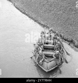 WW2 March 1945 Allied army trucks crossing the Bailey pontoon bridge ...