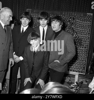 Sir Eric Harrison, high commissioner for Australia, front, center, is ...