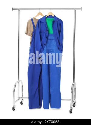 Workers' uniforms on clothing rack isolated on white Stock Photo - Alamy