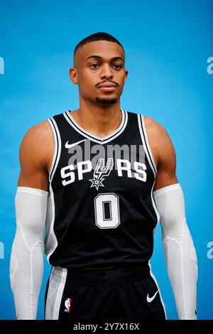 San Antonio Spurs' Keldon Johnson celebrates a basket during the first ...