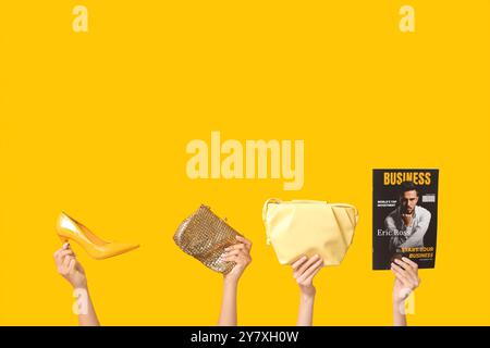Female hands with magazine, high heel and stylish bags on grey ...
