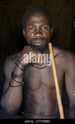 Himba man in his hut, Ohandungu, Kunene region, Kaokoveld, Namibia ...