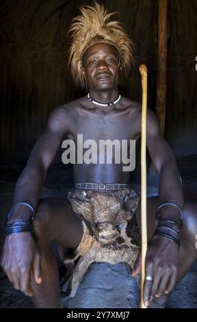 Himba man in his hut, Ohandungu, Kunene region, Kaokoveld, Namibia ...