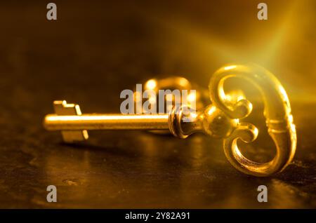 Antique Door Key with Golden Lights and Dark Background Horizontal ...