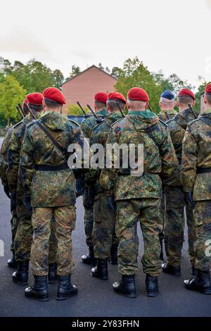 German Bundeswehr soldiers stand in formation wearing combat uniforms ...