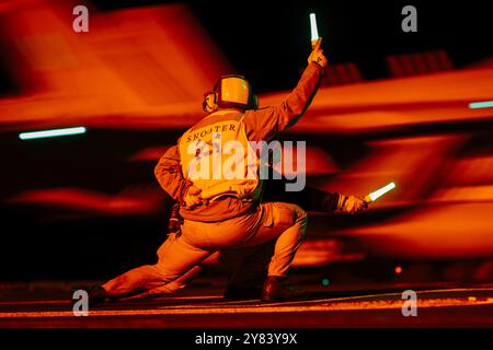 Lt. Cmdr. John Brennan, from Nashville, Tennessee, divisional officer ...