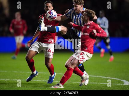 Sheffield Wednesday's Michael Smith (left) and Burnley's CJ Egan-Riley ...