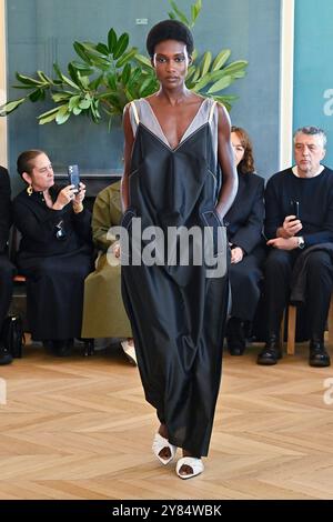 Model Taylor D is seen on the catwalk at the Jil Sander fashion show ...