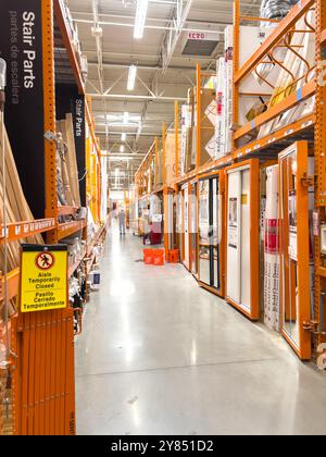 Lumber and Fencing Aisle in a Hardware Store with Wood Planks and ...