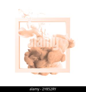 Splash of peach fuzz ink and frame on white background Stock Photo - Alamy