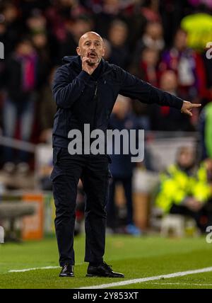 Bologna's head coach Vincenzo Italiano leaves the field with head down ...