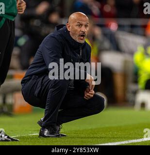 Bologna's head coach Vincenzo Italiano leaves the field with head down ...