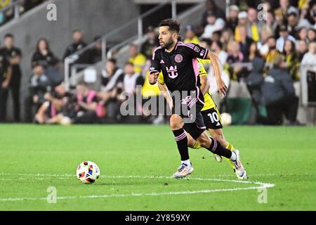Inter Miami defender Jordi Alba, left, heads the ball past Cavalier ...
