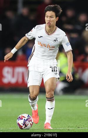 Eom Ji-Sung of Swansea City AFC runs with the ball during the Sky Bet ...