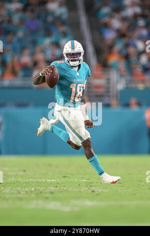 Miami Dolphins quarterback Tyler Huntley (18) during a NFL game against ...