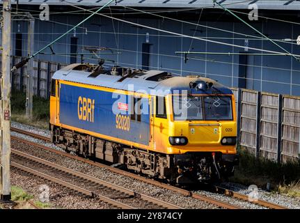 GB Railfreight operated Class 92, 92020 light locomotive passing DIRFT ...