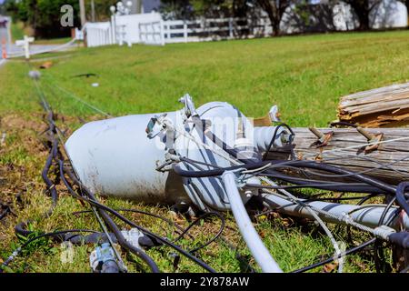 Storm damaged power lines lie broken on ground following hurricane ...