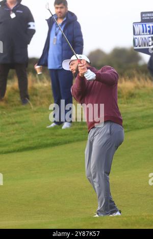 Jon Rahm, of Spain, hits on the 14th hole during a practice round for ...