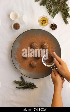Christmas tree made of chocolate truffles, hazelnuts, anise stars ...