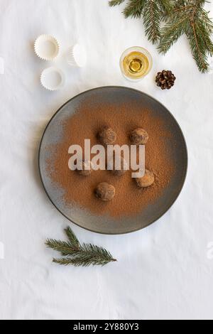 Christmas tree made of chocolate truffles, hazelnuts, anise stars ...