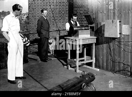 John Logie Baird and Jack Buchanan, the actor, watch Whilst an ...