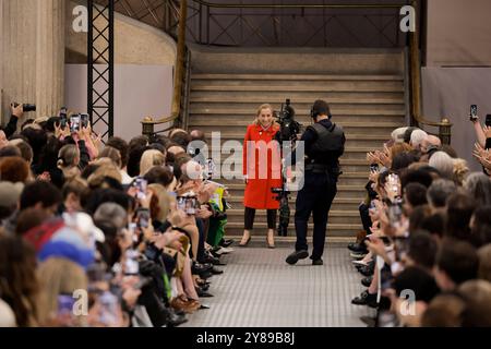 Designer Miuccia Prada is seen on the catwalk at the Miu Miu fashion ...