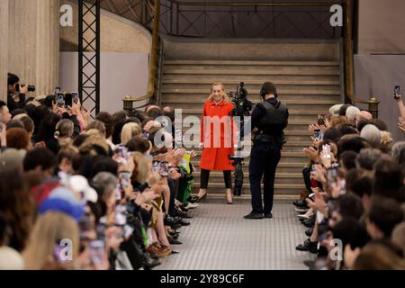 Designer Miuccia Prada is seen on the catwalk at the Miu Miu fashion ...