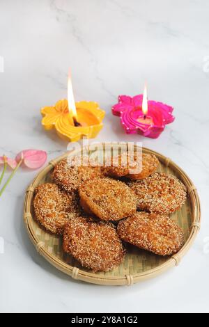 Anarsa is a popular Indian sweet made from rice, sugar, ghee, and poppy ...
