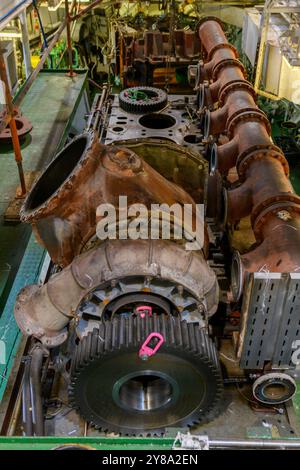 Main engine repairing. Inside engine room on big ship. Marine engine on ...