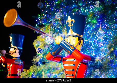 Christmas Decoration a trumpeter. Christmas time with the tree lit up ...