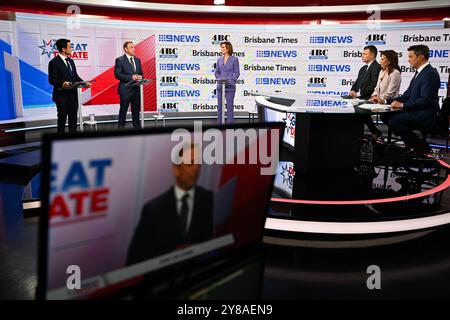 Queensland Premier David Crisafulli (second left) during the Liberal ...