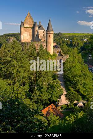 Exterior view of Vianden Castle with towers and fortifications on a ...