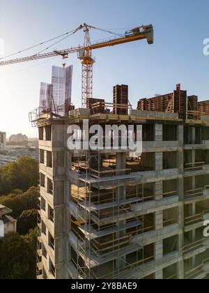 A drone video capturing the construction site of a high-rise building ...
