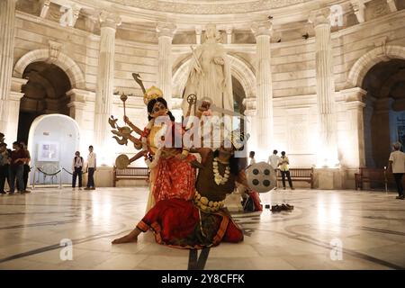Dancers perform the ''Durgotsab'' dance dressed as goddess Durga and a ...