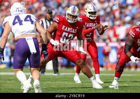 Kansas offensive lineman Logan Brown (OL04) poses for a portrait at the ...