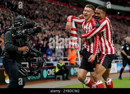 Sunderland's Wilson Isidor (left) celebrates scoring their side's ...