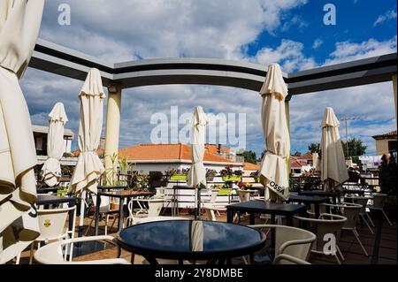 Sunny rooftop terrace at mercado dos lavradores, offering a peaceful ...