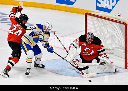 New Jersey Devils' Jacob Markstrom stands on the ice during the first ...