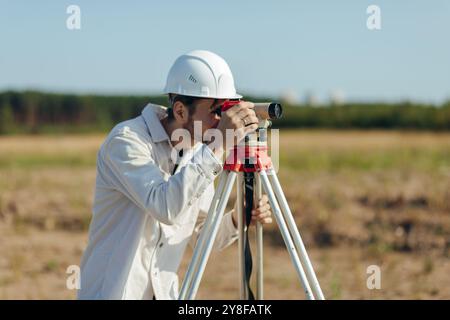 Survey engineer working with operating level survey cameras on ...