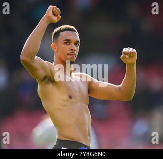 Trent Alexander-Arnold of Liverpool celebrates with Mohamed Salah of ...