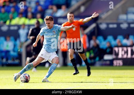 Coventry City's Jack Rudoni scores their side's first goal of the game ...