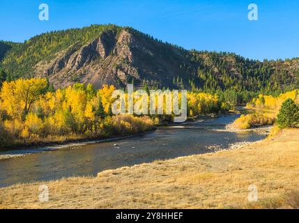 fall colors and cliffs along the blackfoot river near ovando, montana ...