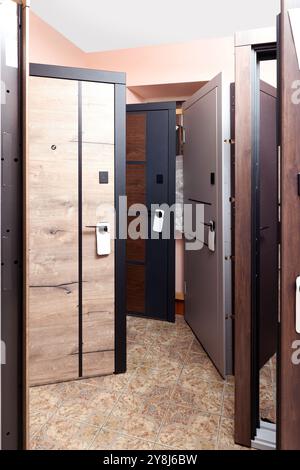 Group of different modern doors in store Stock Photo - Alamy