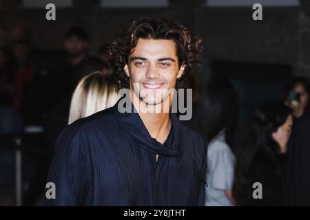 Thomas Ceccon attends the Emporio Armani fashion show during Milan's ...