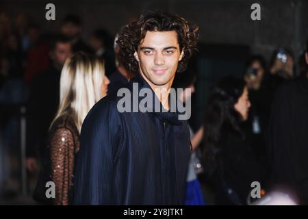 Thomas Ceccon attends the Emporio Armani fashion show during Milan's ...