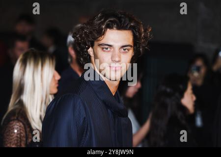 Thomas Ceccon attends the Emporio Armani fashion show during Milan's ...