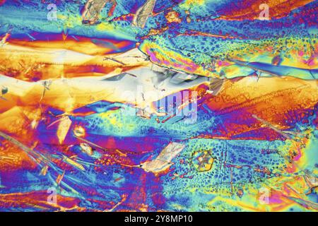 Potassium hydroxide under the microscope and in polarised light Stock ...
