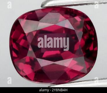 Exquisite Deep Red Cushion-Cut Ruby Gemstone Captured in Radiant Light ...