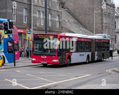 First Bus bendy bus in Aberdeen Stock Photo - Alamy